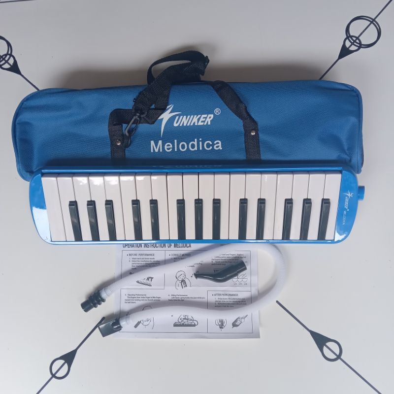 Jual PIANIKA/PIANIKA KAIN MELODICA UNIKER 32 KEY ANAK SD /( BISA COD ...