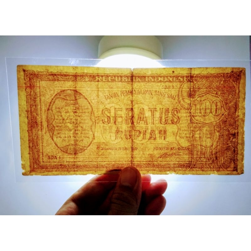 Jual UANG KERTAS 100 RUPIAH SOEKARNO MERAH ORI3 TAHUN 1947 LANGKA ...
