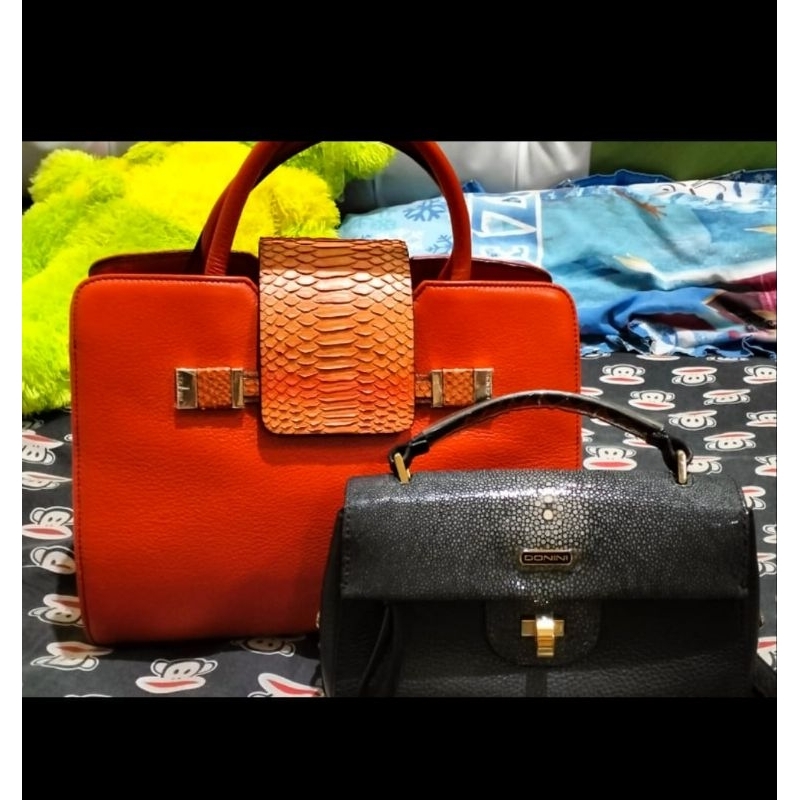 Jual Tas Oren Donini model tabung besar mulus | Shopee Indonesia