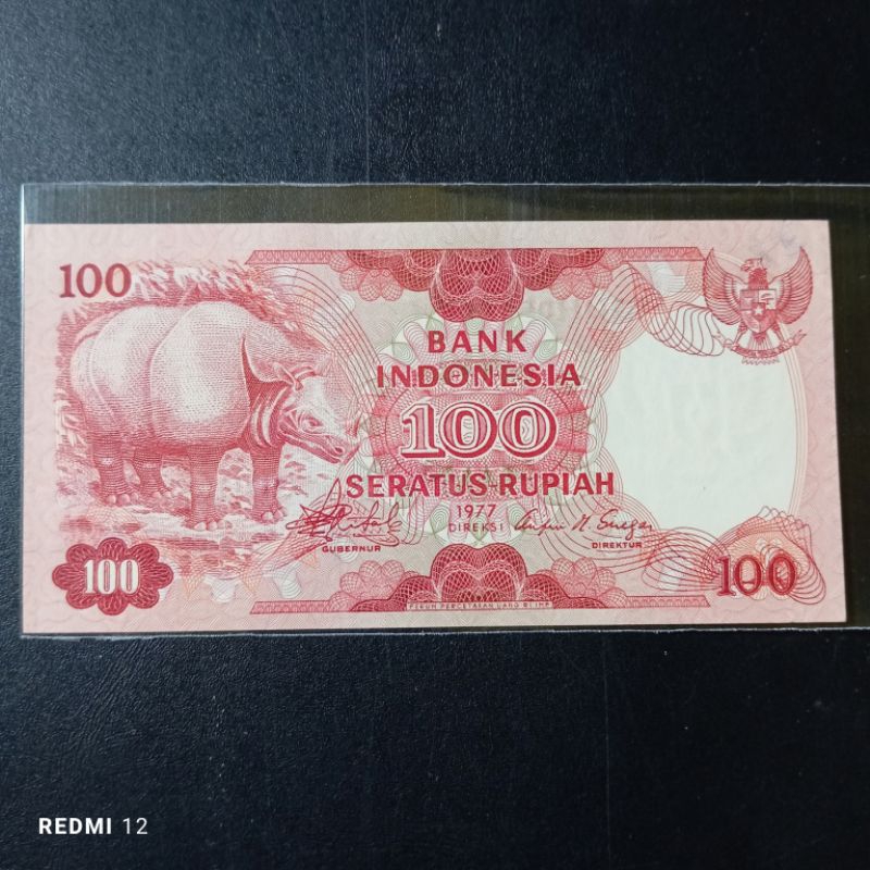 Jual uang kertas kuno 100 rupiah badak tahun 1977 seperti baru dikit klupas QOH055443 | Shopee ...
