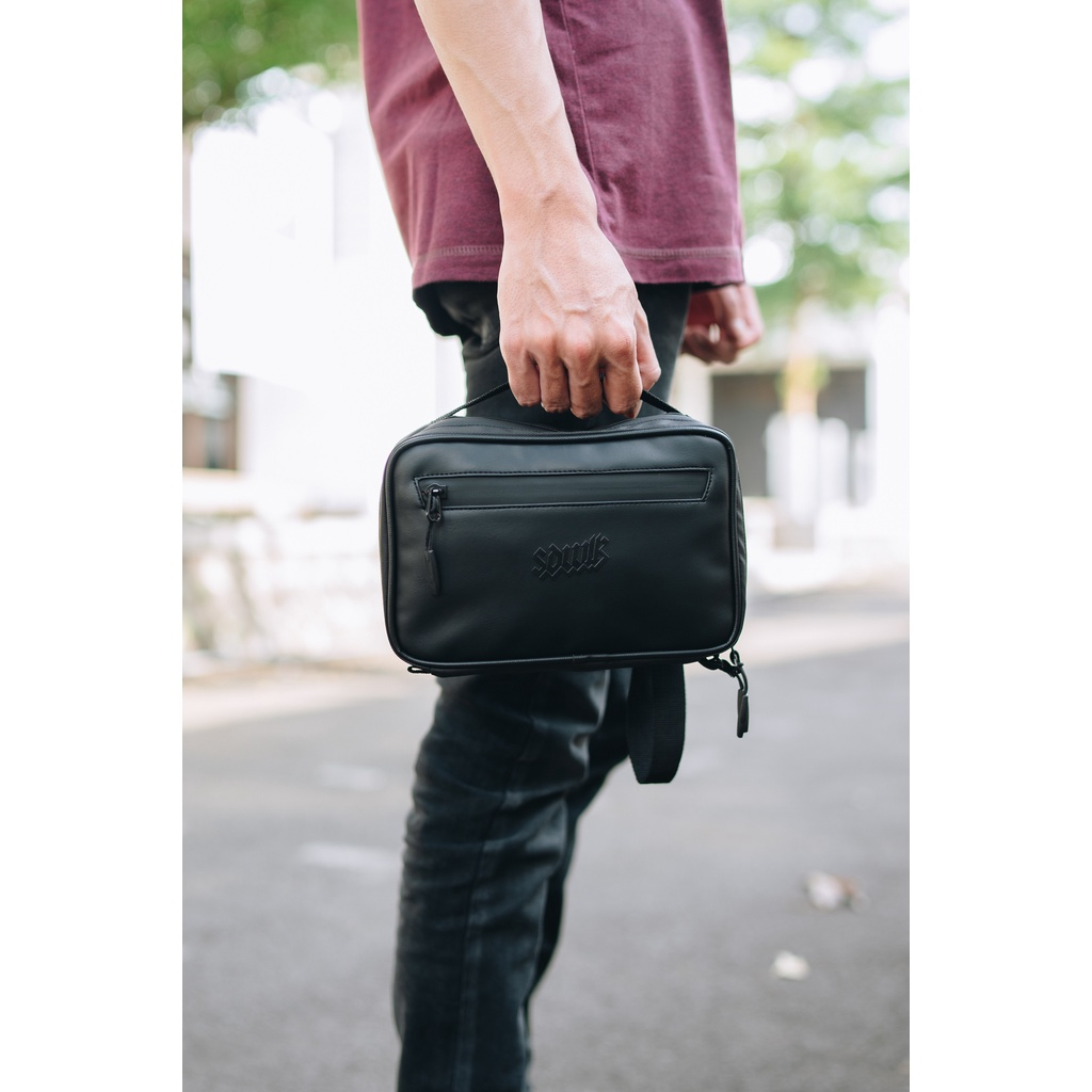 Jual Tas Tangan Pria Clutch Multifungsi Cosmic Sidewalk full Black ...