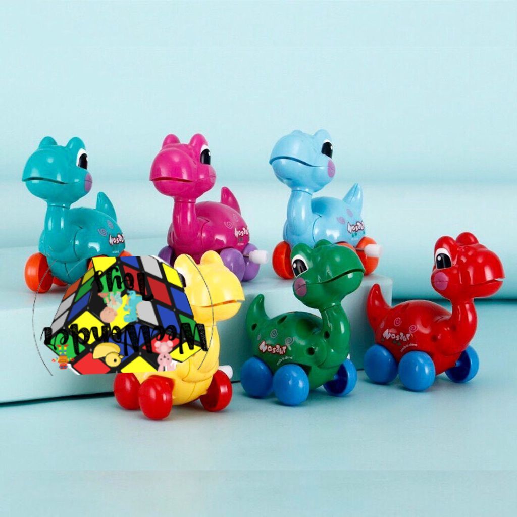 Jual mainan dinosaurus putar jalan figure dino winding up warna warni ...