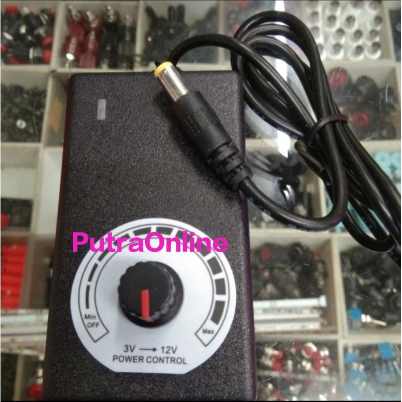 Jual Adaptor DC 3V-12V 2A Universal Input AC 100-240V Made in China ...
