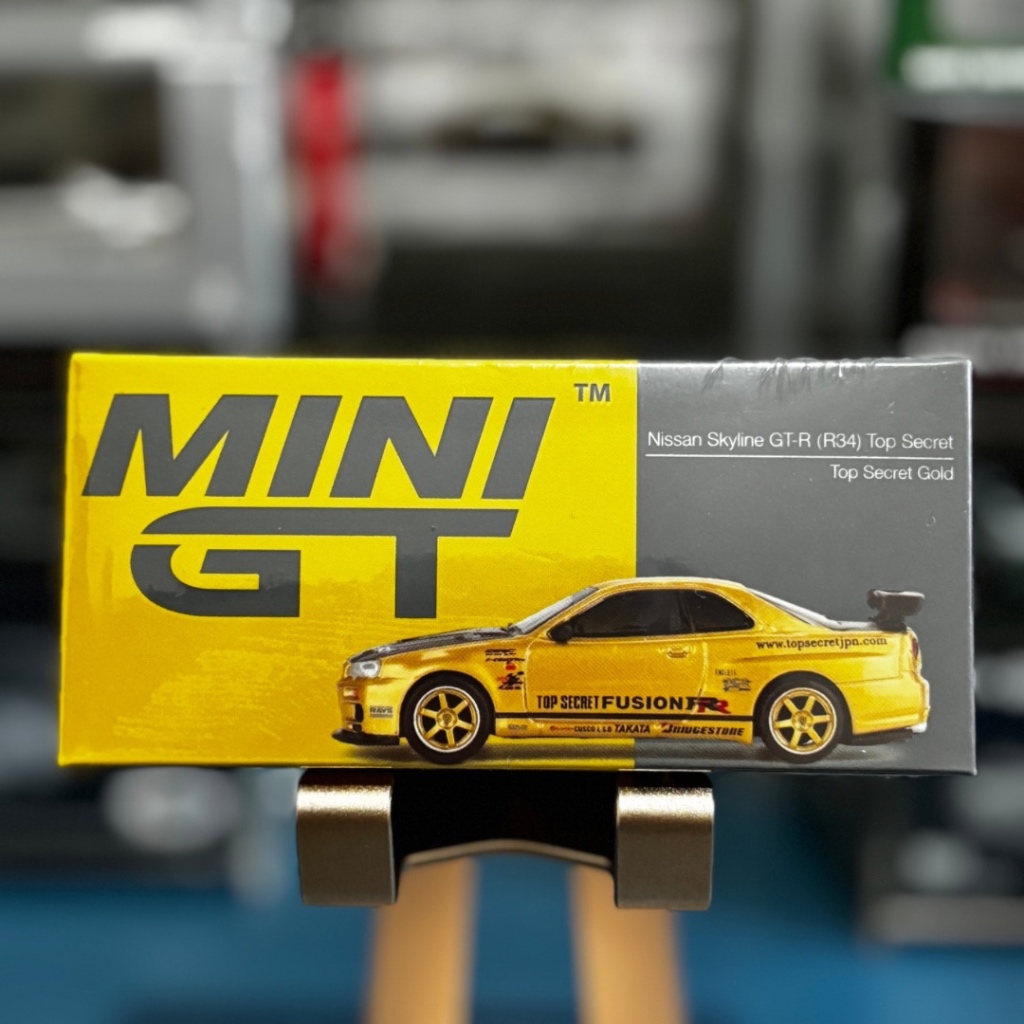 Jual Mini GT 676 - Nissan Skyline GT-R (R34) Top Secret GOLD | Mini GT ...