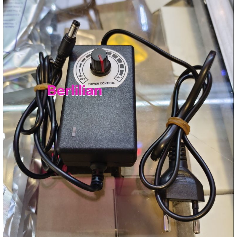 Jual Adaptor Multi Fungsi DC 3V-12V 2A input AC 100V-240V Made in China ...