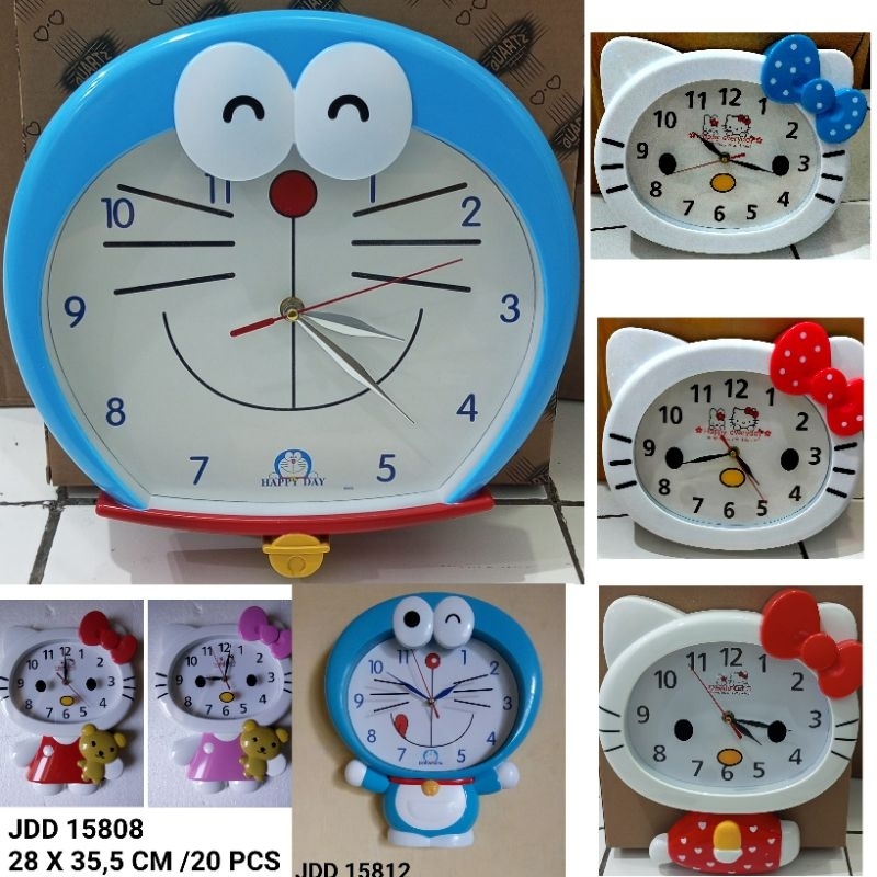 Jual jam dinding karakter hello Kitty dan Doraemon diameter 28x35cm+ Baterai AA | Shopee Indonesia
