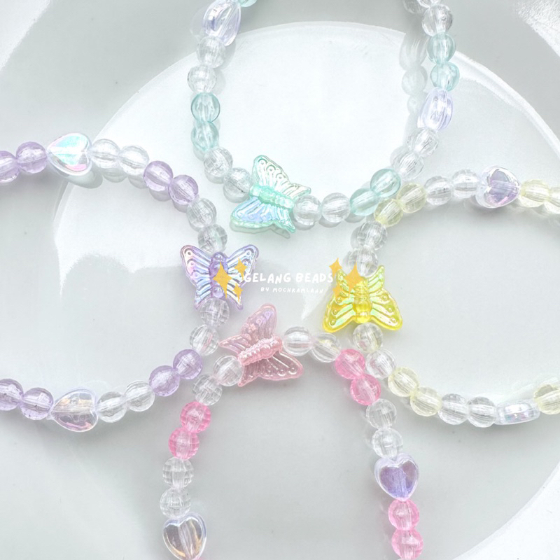 Jual GELANG MANIK KOREA MODEL KUPU TRANSPARAN / GELANG KUPU AESTHETIC ...