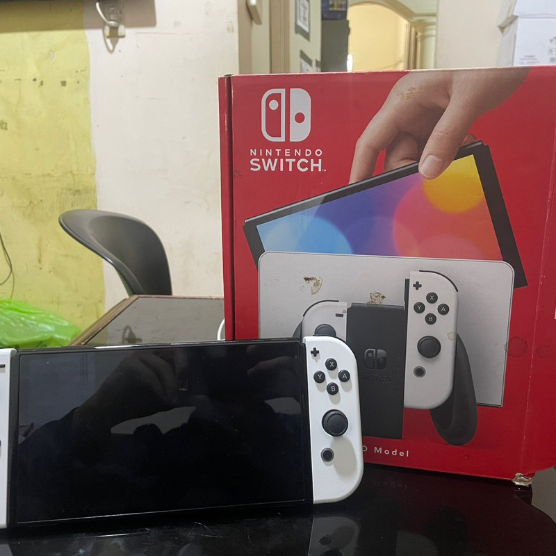 Jual Nintendo Switch Oled second + 4 cartrdige game (ada box) | Shopee ...