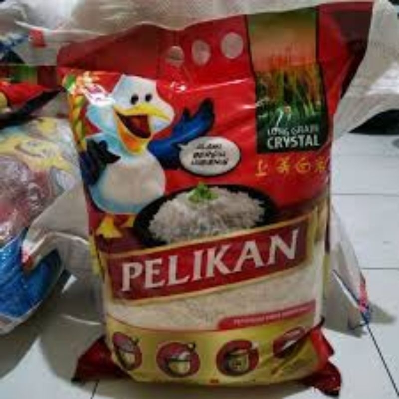 Jual BERAS PELIKAN PUNEL ENAK /BERAS UTUH KEMASAN 5KG | Shopee Indonesia