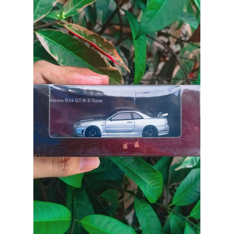 Jual Motorhelix 64 Nissan Skyline GT-R R34 Nismo Z-Tune Silver | Shopee Indonesia