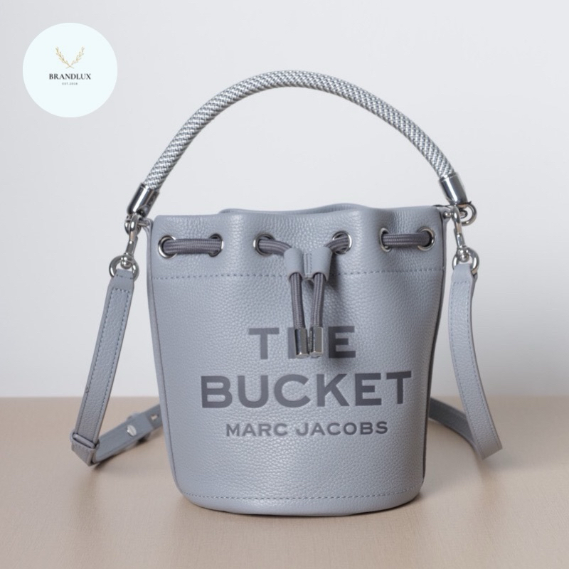 Jual MJ Embossed Logo Bucket Bag in Wolf Grey Leather | Shopee Indonesia