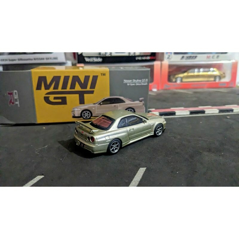 Jual Diecast Mini Gt Nissan Skyline GTR R34 M Spec Silica Breath no 348 | Shopee Indonesia