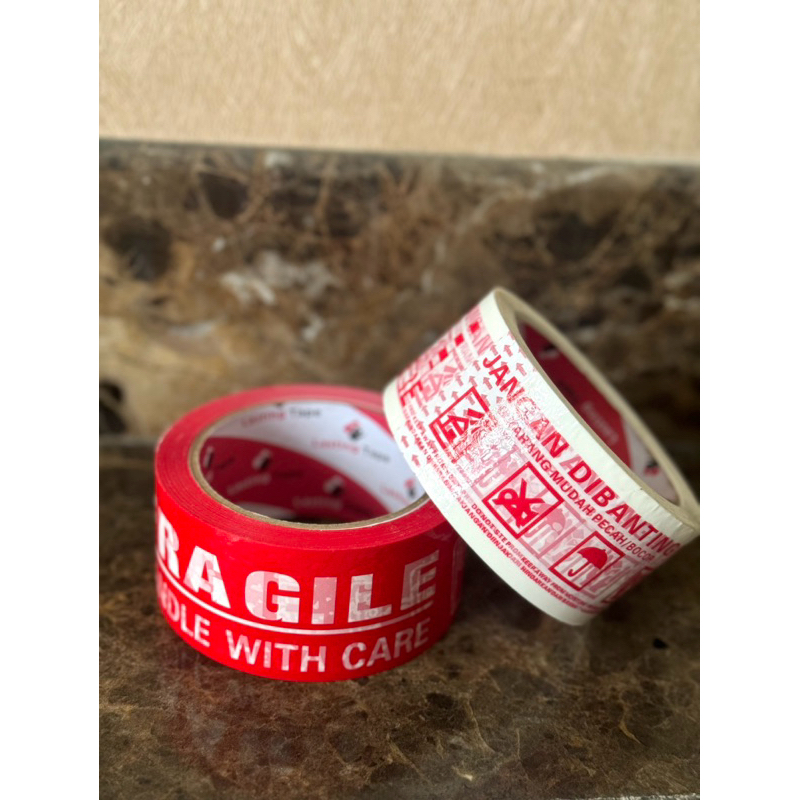 Jual LAKBAN FRAGILE UNBOXING 48 MM x 60 METER (65Yrd) / LAKBAN MERAH ...