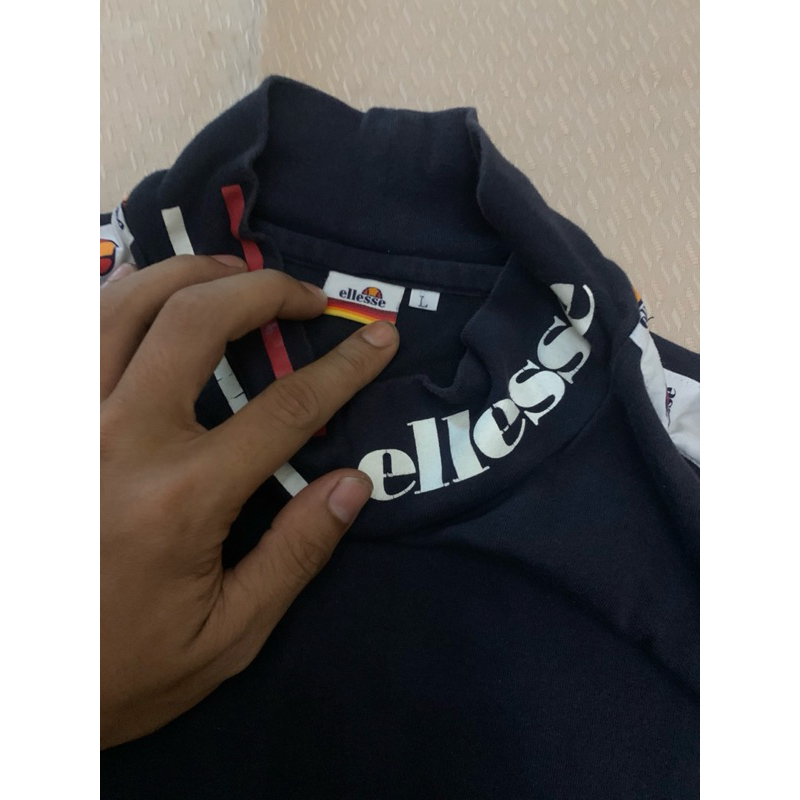 Jual Ellesse kaos pendek turtle neck second original | Shopee Indonesia