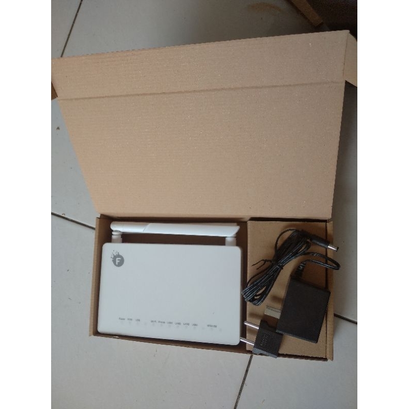 Jual Modem ZTE F477 v8 Epon Onu + Adaptor | Shopee Indonesia