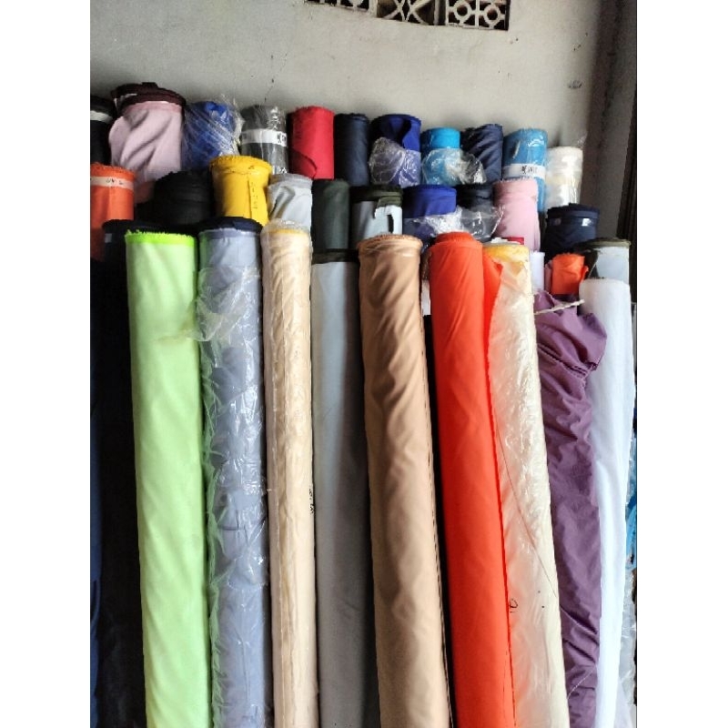 Jual %100 KAIN BAHAN TASLAN MILIKY TEBAL WATERPROOF JUAL (PER YAR ...