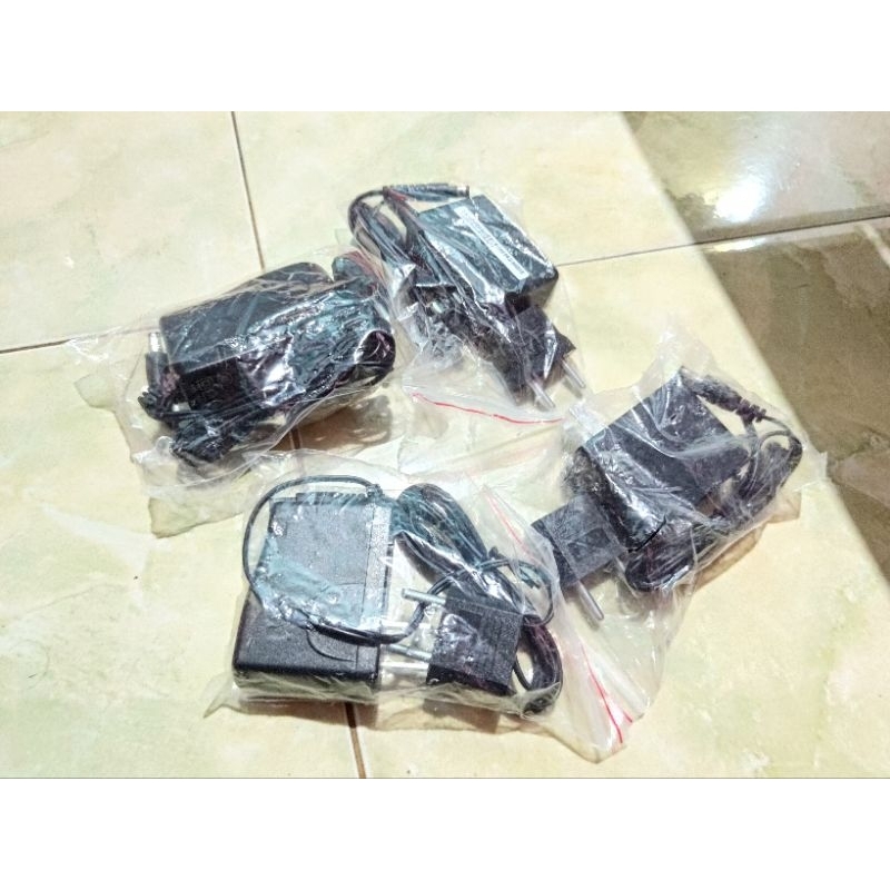 Jual power supply adaptor bulat ont stb cctv 12v 1a 5,5 x 2,1mm hitam ...