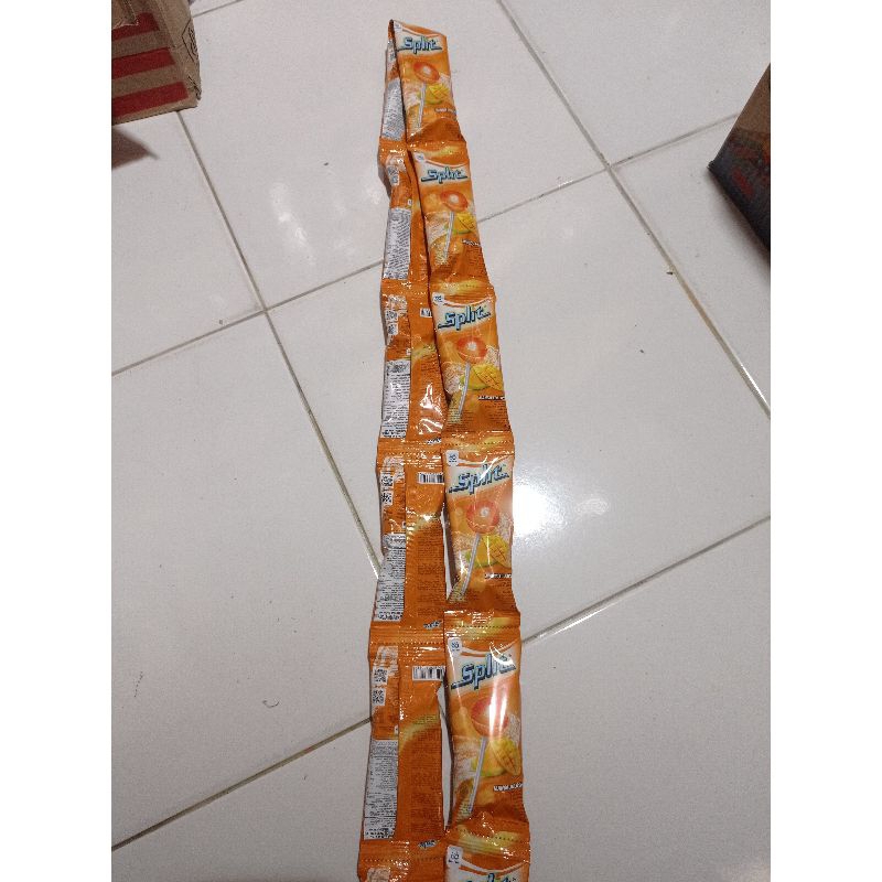 Jual Permen lolipop sunduk Split rasa mangga 1 renceng isi 12 pcs ...