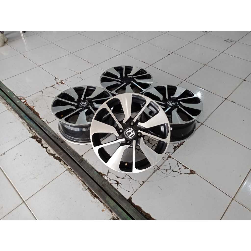 Jual 4 pcs velg bekas copotan brio ring 15 pcd 4x100 warna two tone ...