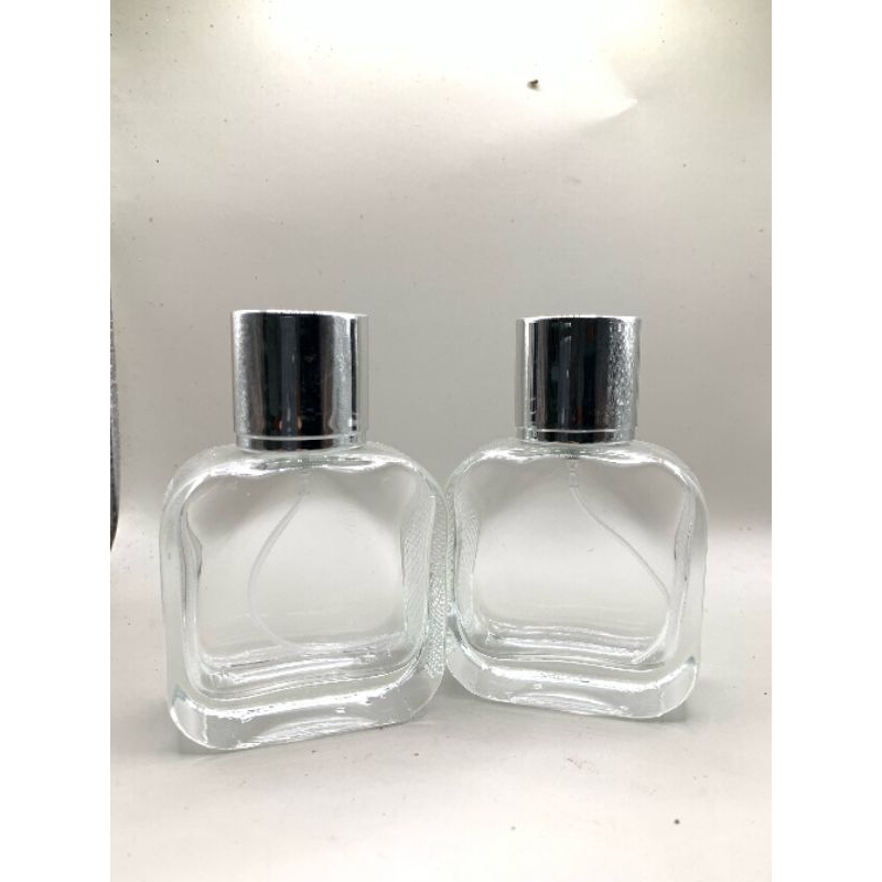 Jual (LUSIN) BOTOL PARFUM KOTAK LAC0STE 50ML DRAT PUTAR ULIR | Shopee ...