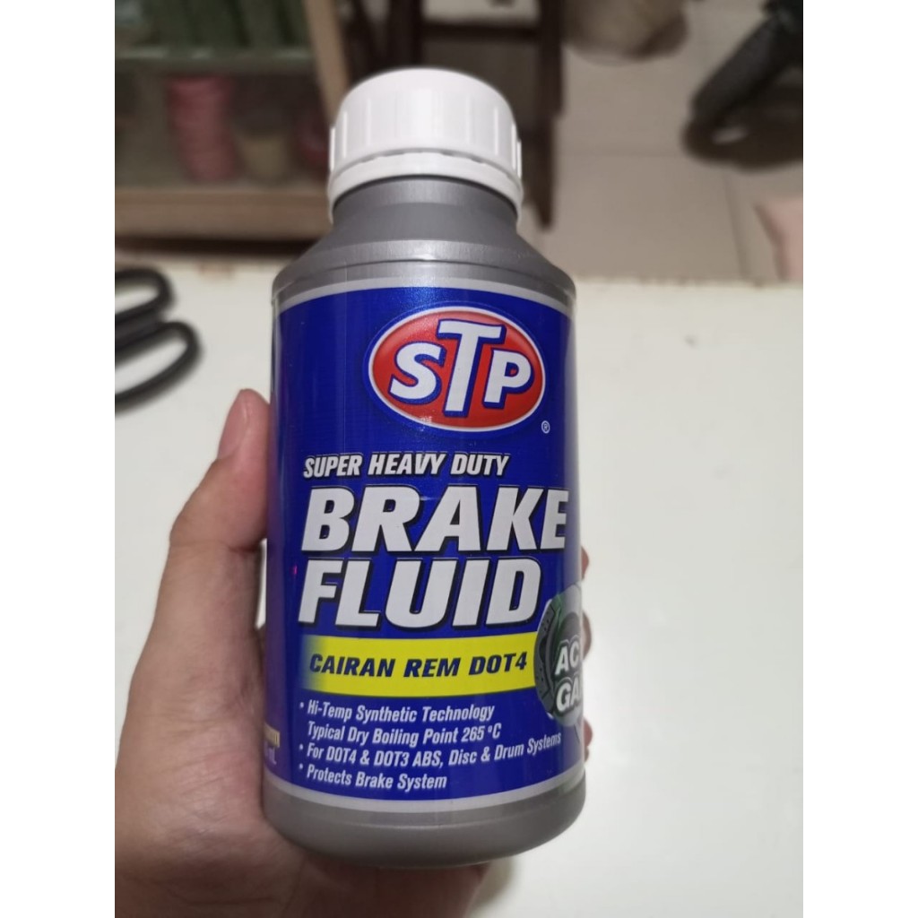 Jual STP Brake Fluid Minyak Rem 300 ml DOT 4 Cairan Minyak Rem Mobil Motor Matik Manual | Shopee ...
