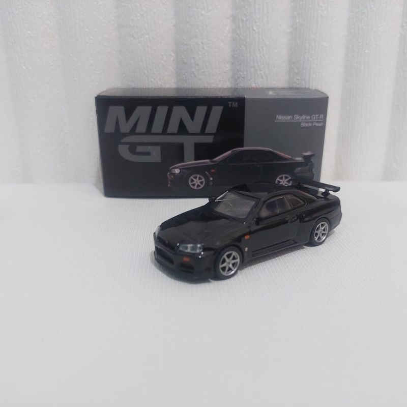 Jual Mini GT 570 Nissan Skyline GTR R34 Black Pearl Hitam | Shopee ...