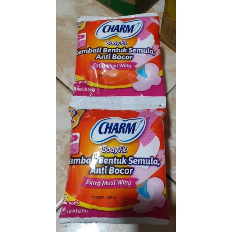 Jual CHARM MAXI EXTRA WINGS 23CM ISI 10 SACHET (PER SACHET ISI 2 PADS ...