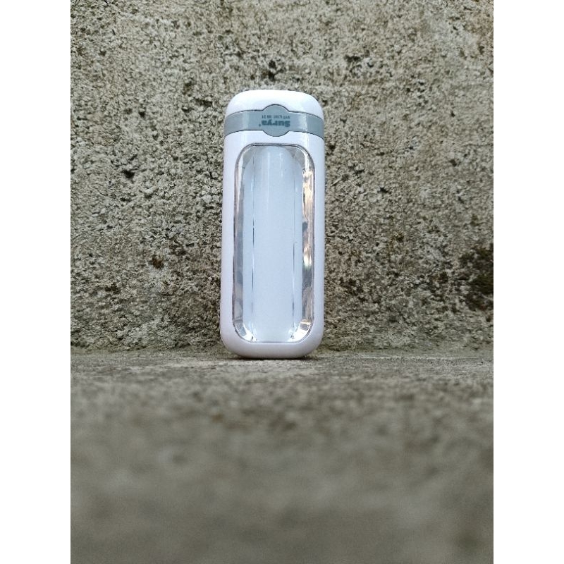 Jual Lampu Senter SURYA SYT L101 SMD LED Emergency Rechargeable ...