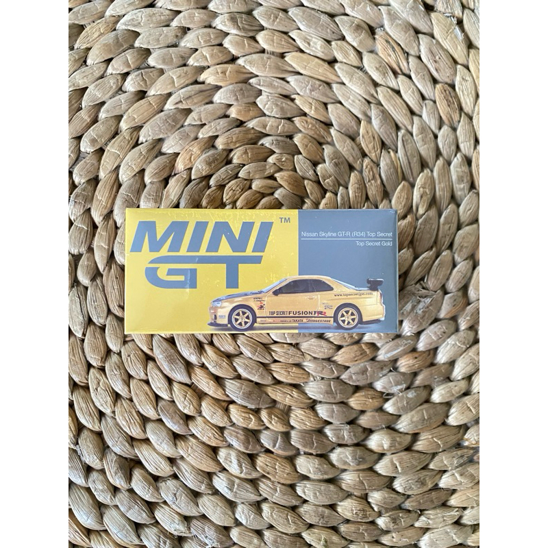 Jual Mini GT 676 Nissan Skyline GTR (R34) Top Secret Gold SEGEL ...