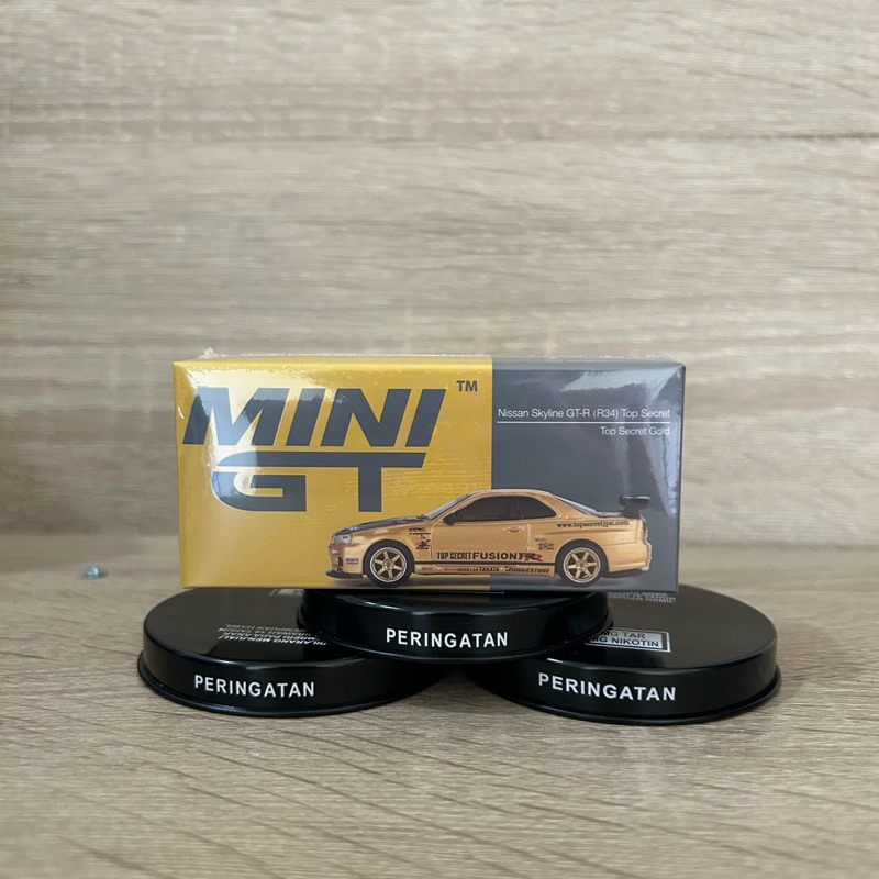 Jual mini gt minigt 676 nissan skyline gtr r34 top secret gold japan ...