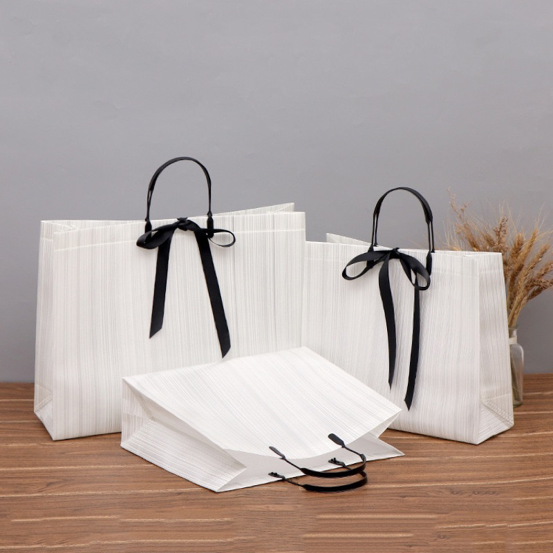 Jual Premium Tas Spunbond Putih Dengan Pita / Goodie Bag Spunbond ...