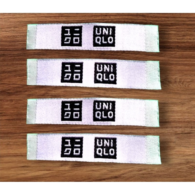 Jual WOVEN RAJUT UNIQLO PREMIUM | TAG UNIQLO ( 300 PCS ) | Shopee Indonesia