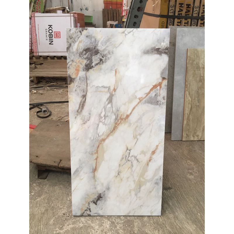 Jual keramik dinding 30x60 motif marmer carara glossy kilap grey brown blue uno mewah cutting ...