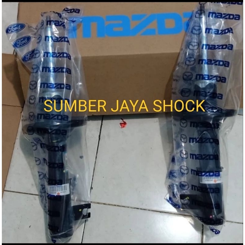 Jual shockbreaker Mazda interplay 323 depan original | Shopee Indonesia