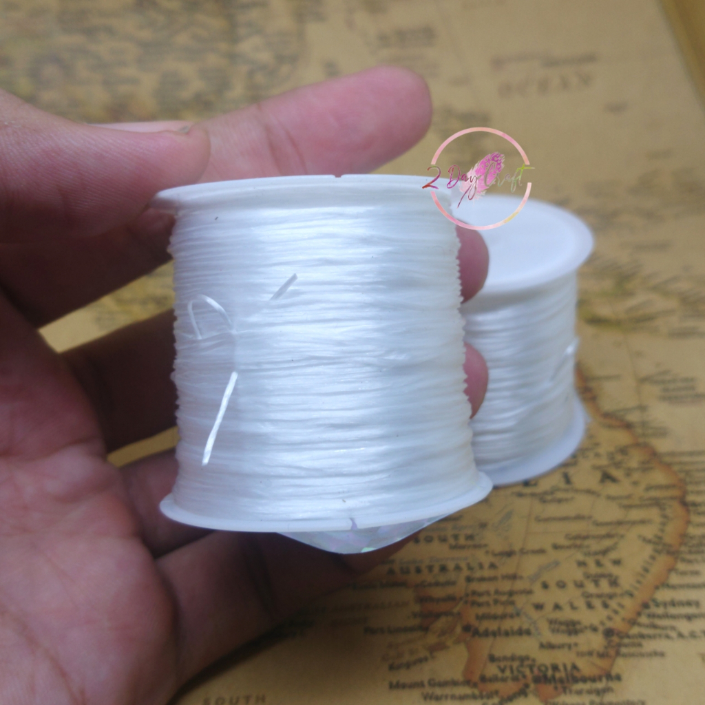 Jual Tali Benang Karet Elastis 60 Meter per Roll Hitam Putih Ukuran 0,6 ...