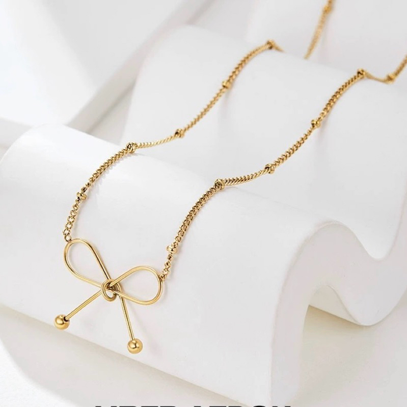 Jual AE-2 Kalung Titanium Wanita Plus Liontin Pita Anti Karat selamanya ...