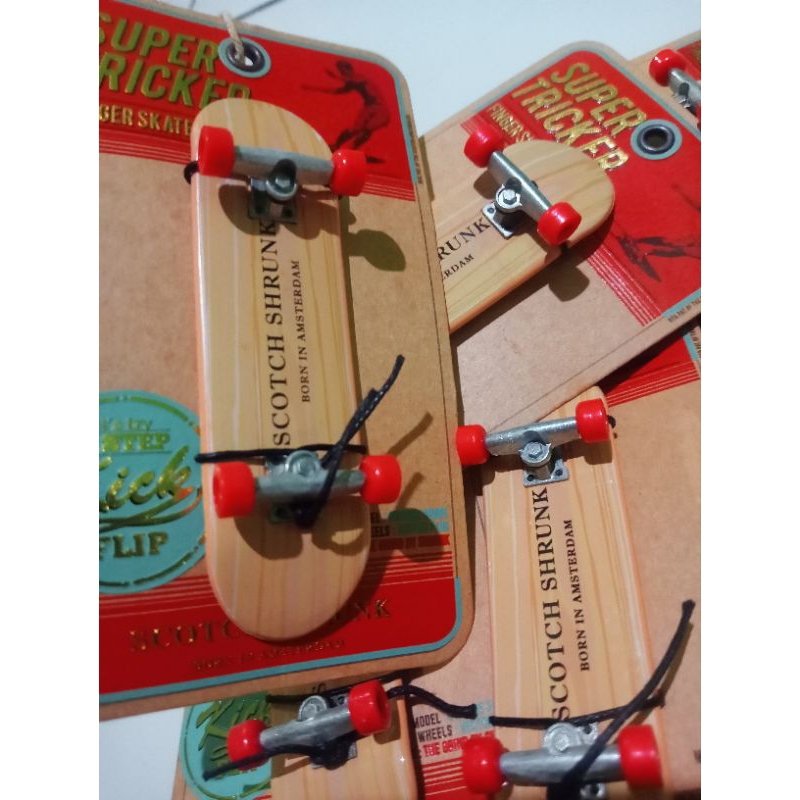 Jual SKATEBOARD JARI MINI SUPER TRICKER/FINGERBOARD/SCOOTCH SHRUNK ...