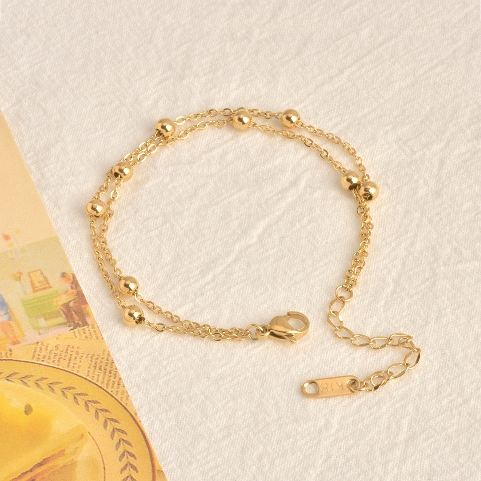 Jual gelang rantai gold 2 layer nuri biji lafa bahan titanium anti ...