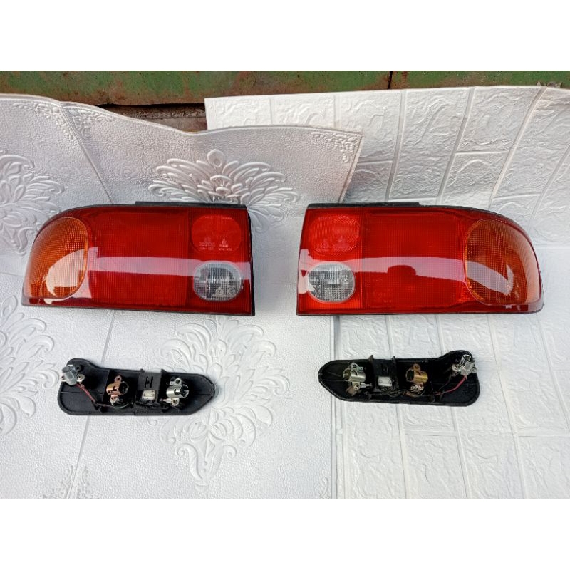 Jual Stoplamp / lampu belakang Mitsubishi Lancer Evo 3 orisinil Stanley | Shopee Indonesia