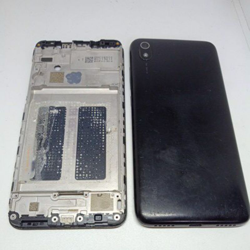 Jual Frame tatakan lcd plus backdoor Redmi 7a Original bekas Copotan ...