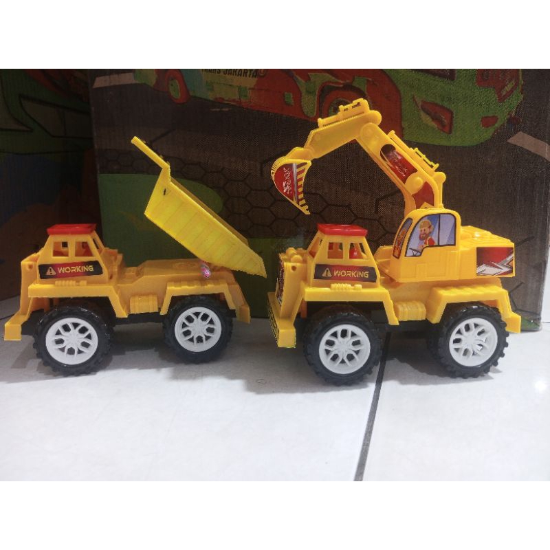 Jual Mainan mobil truk kuning konstruksi kantong ada dua macam varian ...