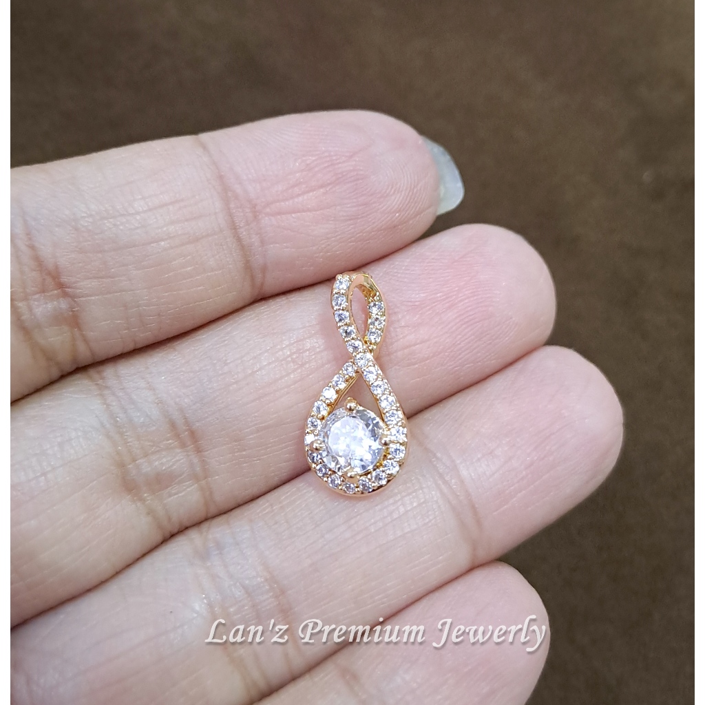 Jual Liontin Melody Solitare Kristal Berlian Titanium EMAS 22K ...