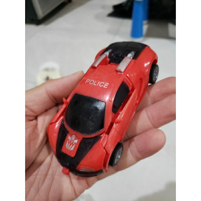 Jual JUALAN MAINAN TRANSFORMASI BERUBAH ROBOT MERAH MOBILAN AUTOBOTS ...