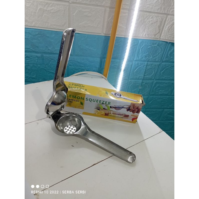 Jual Lemon squeezer alat peras perasan jeruk lemon stainless steel ...