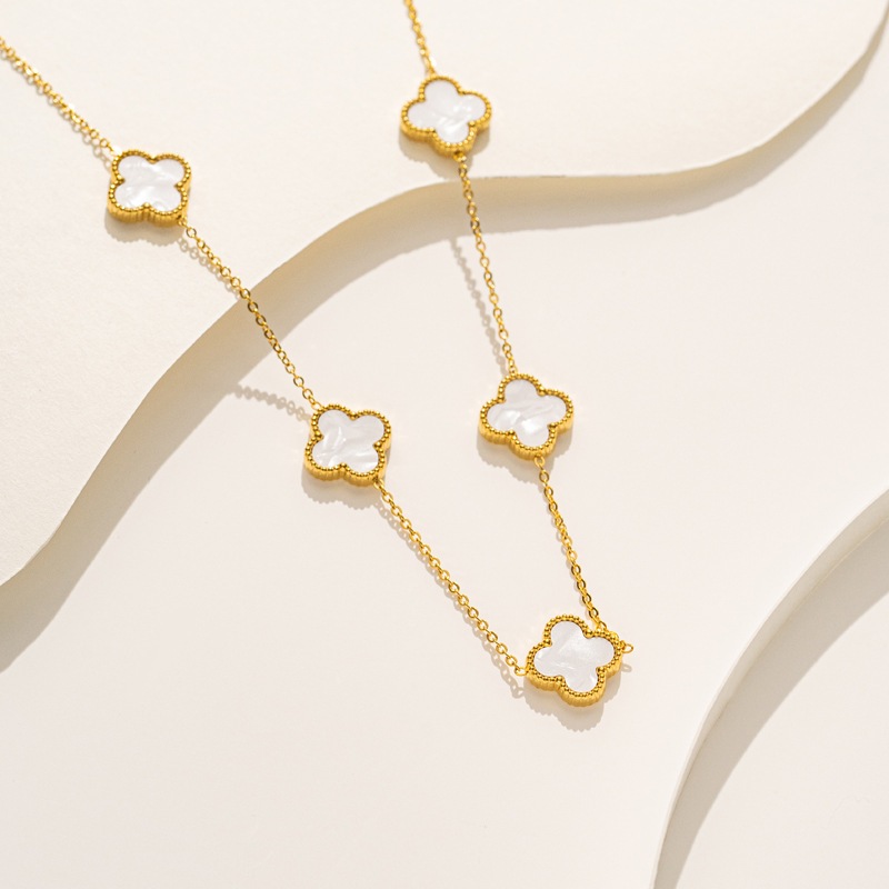 Jual KALUNG TITANIUM BUNGA CLVR GERIGI BOLAK BALIK PERHIASAN WANITA ...