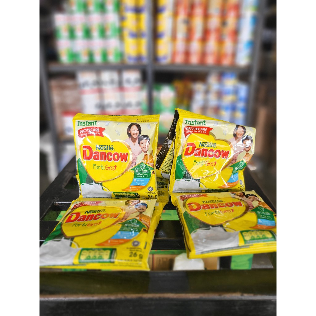 Jual Susu Bubuk Dancow Fortigrow Sachet 1 renteng 26 gr isi 10 | Shopee ...