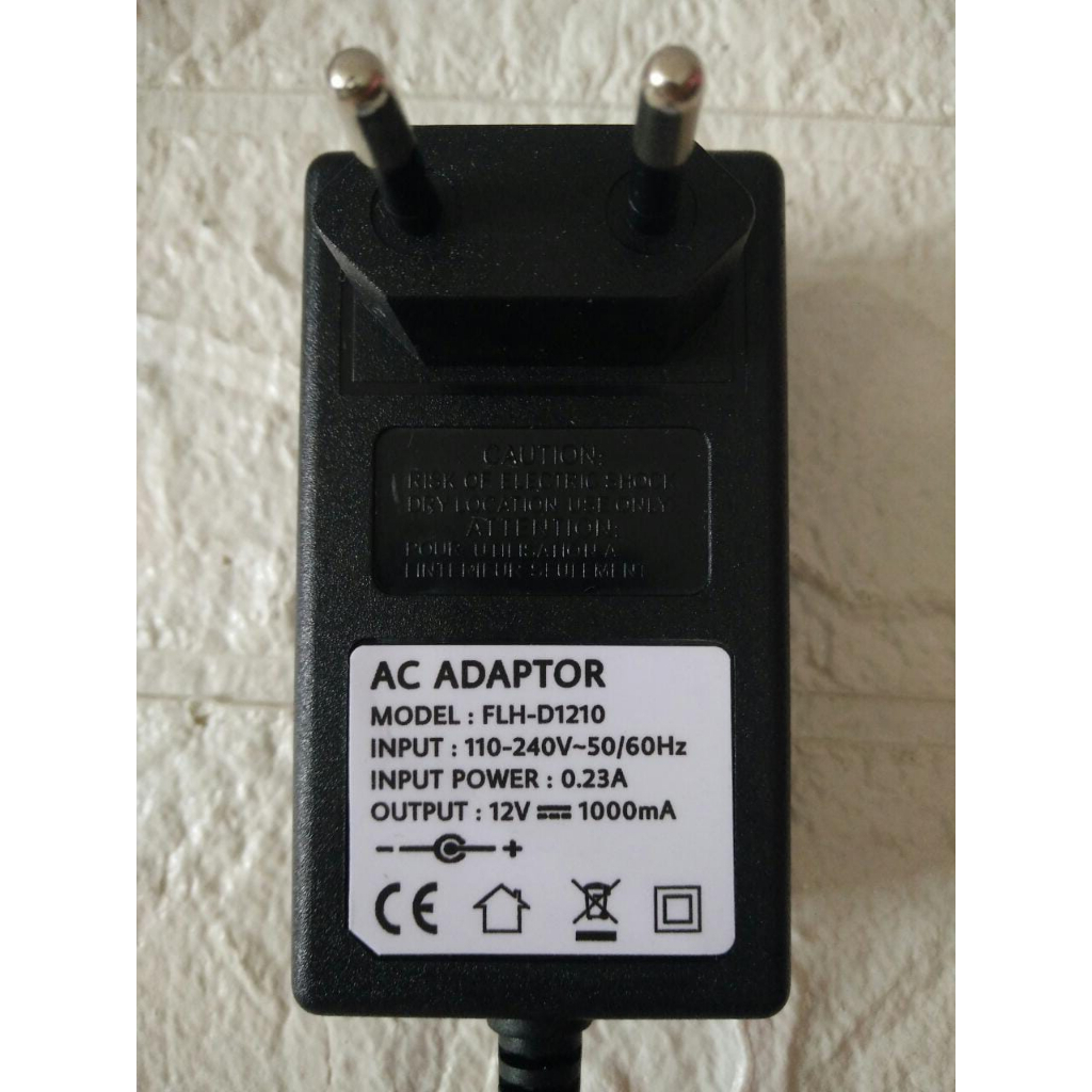 Jual AC ADAPTOR 12V 1000mA model FLH-D1210 | Shopee Indonesia