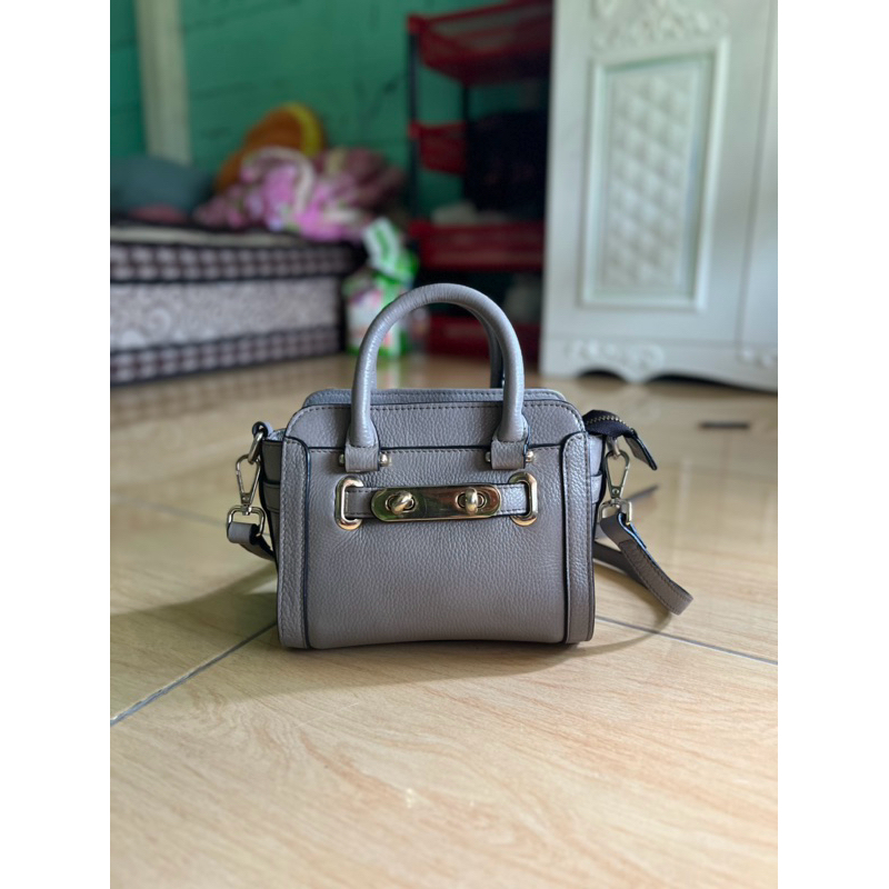 Jual sling ala coach sweger preloved | Shopee Indonesia