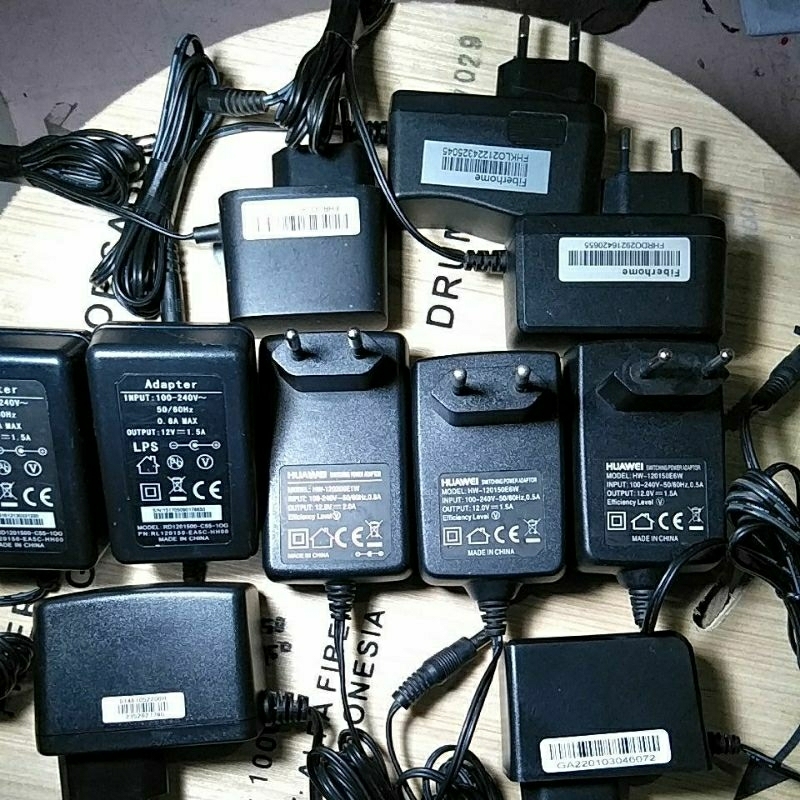 Jual ADAPTOR Bawaan ONT 12v 1,5A merk random,buat modem/router/cctv/stb ...
