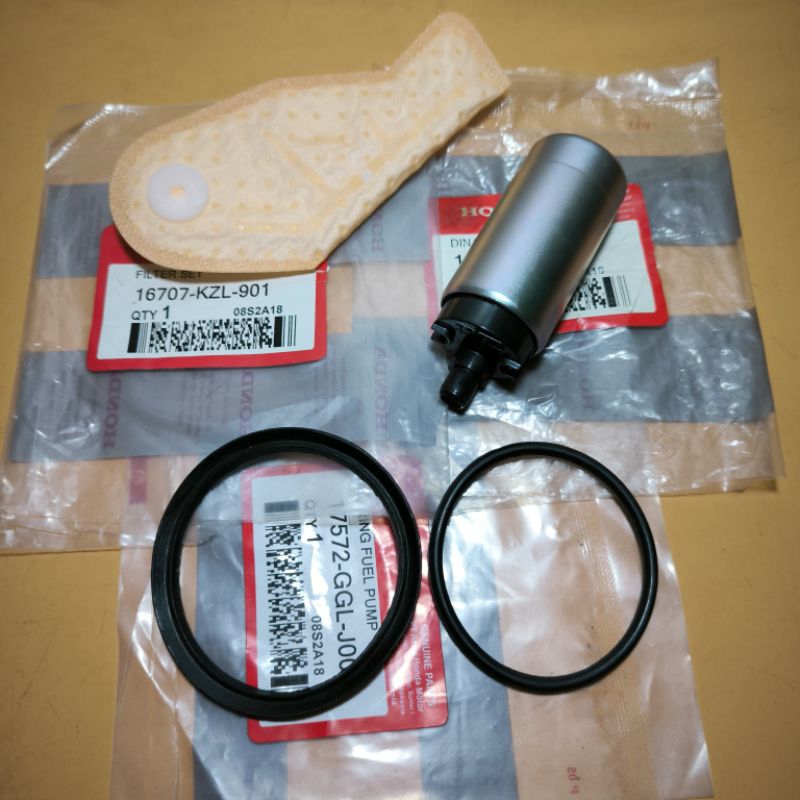 Jual Paket rotak dinamo fuel pump plus filter set dan seal oring pompa ...